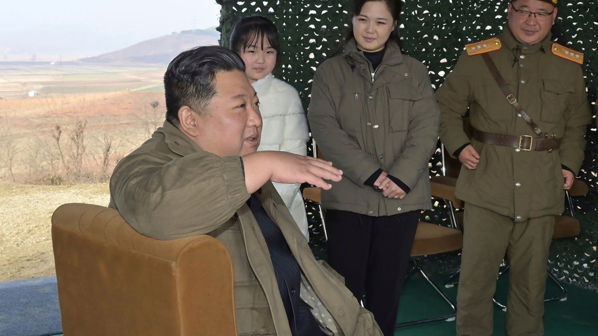 North Korea’s Kim Reveals Daughter to the World at Missile Launch Site ...