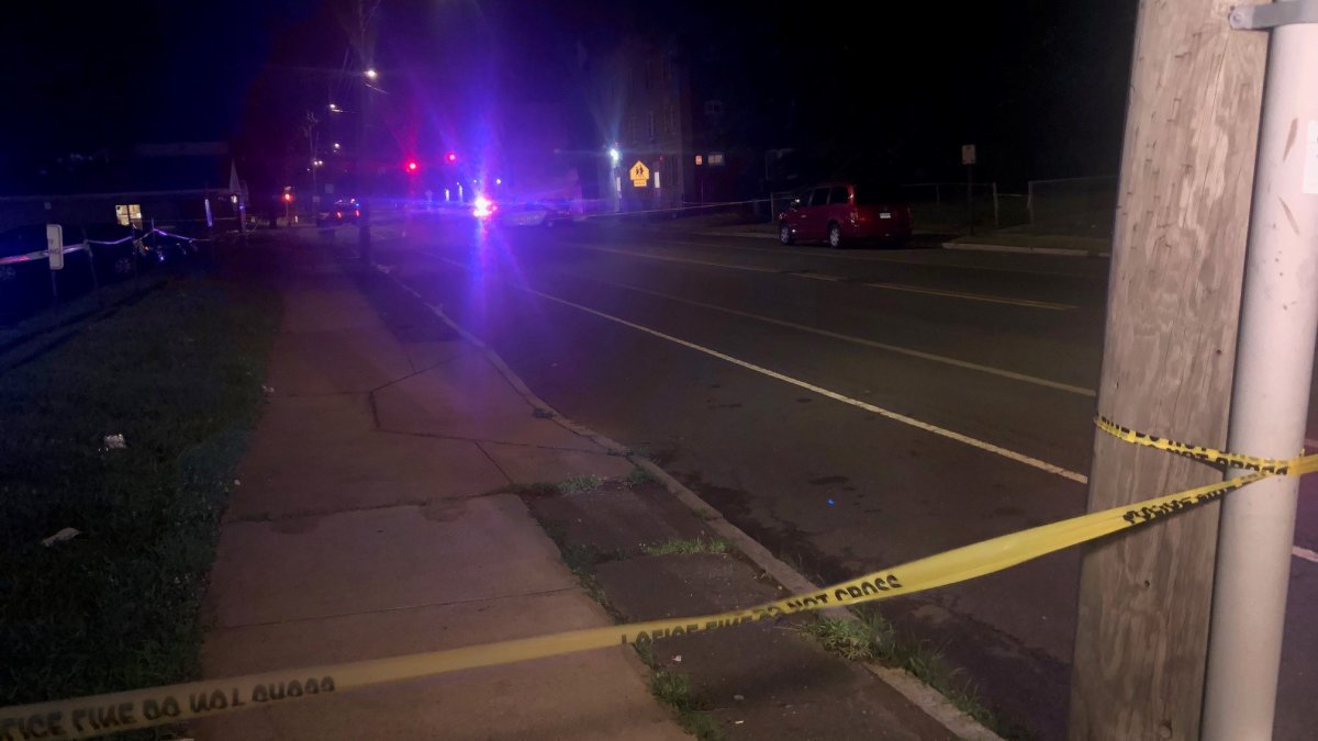 Drive-by shooting leaves a bystander dead and another critically hurt ...