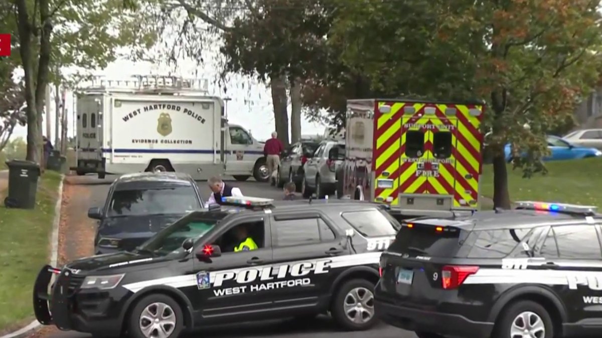 Police in tactical gear with long guns surround home in West Hartford ...