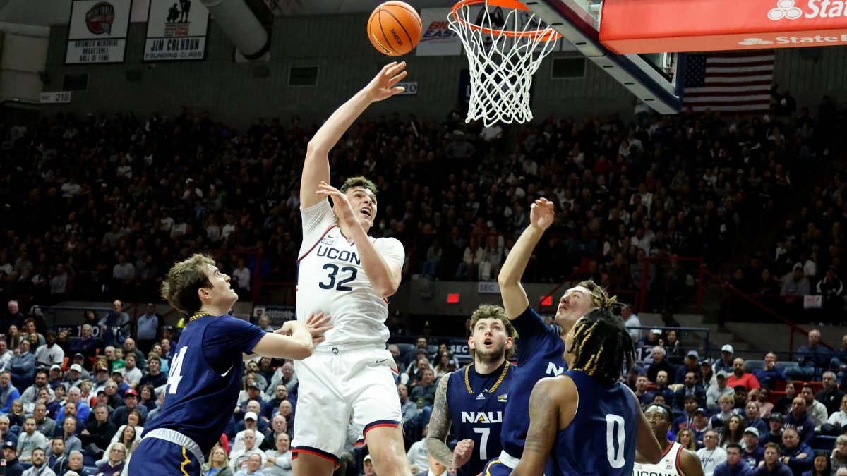 No. 6 UConn unveils championship banner, routs Northern Arizona 95-52 ...