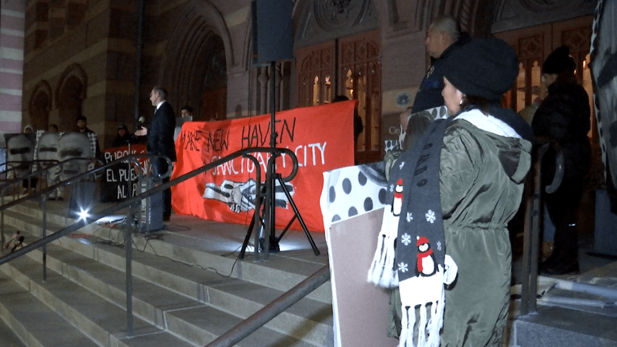 Immigrant community rallies in New Haven after city employee placed on ...