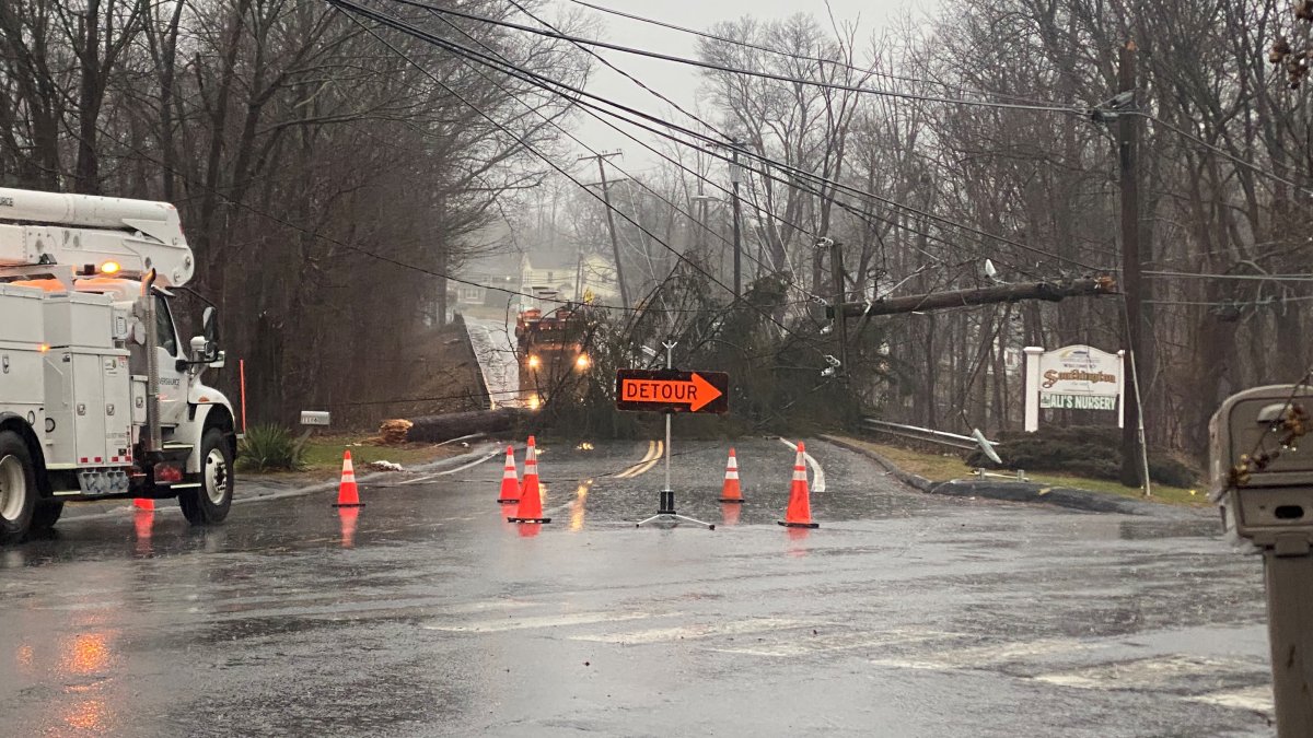 Photos: Rain and wind cause flooding and power outages across the state ...