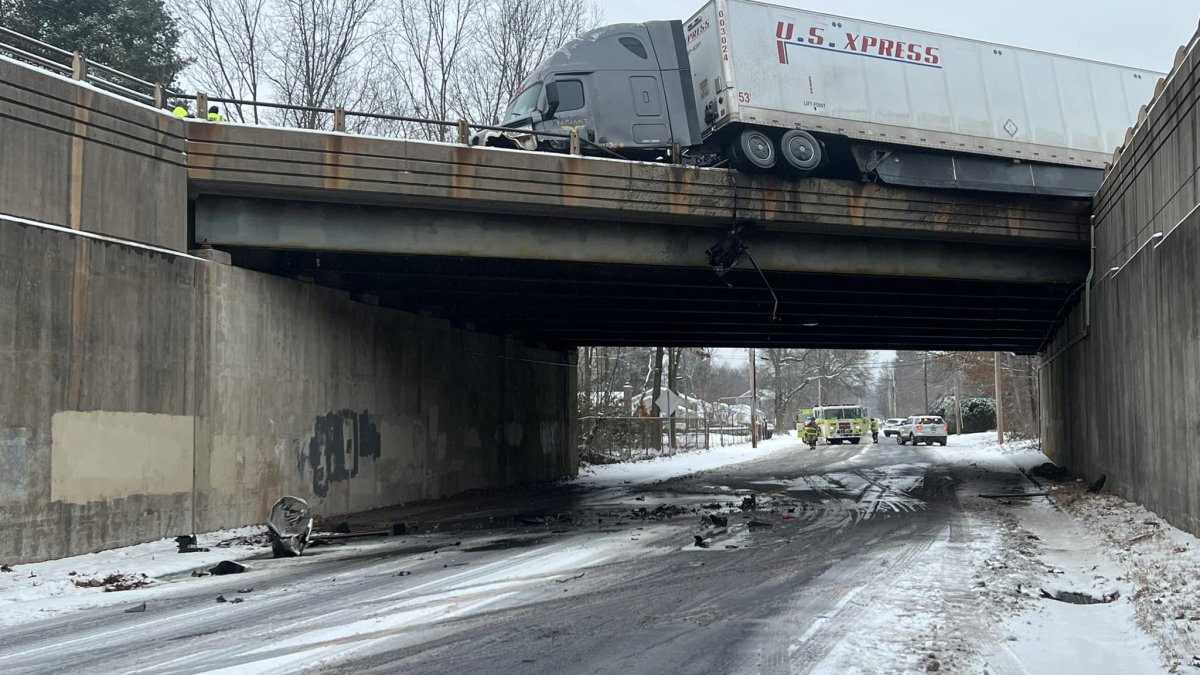 Crash leaves tractor-trailer hanging off of I-91 South overpass in North Haven – NBC Connecticut