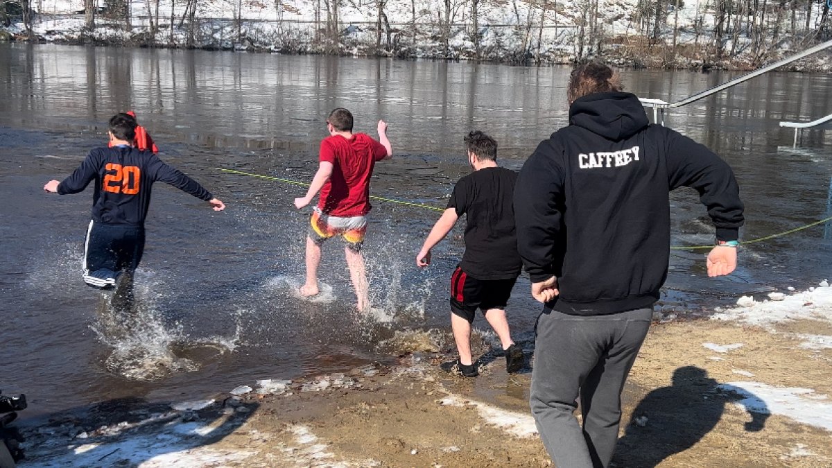 Wolcott High School’s unified sports team plunges into ice cold water ...