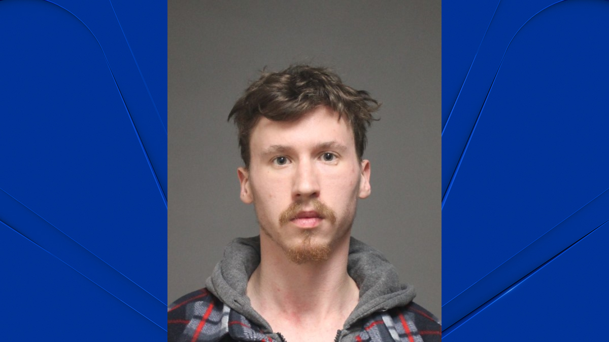 Former school employee charged with child pornography is re-arrested in ...