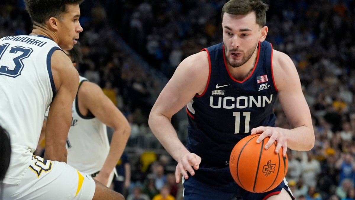 No. 2 UConn outlasts No. 8 Marquette 74-67 for first Top 25 road win in ...