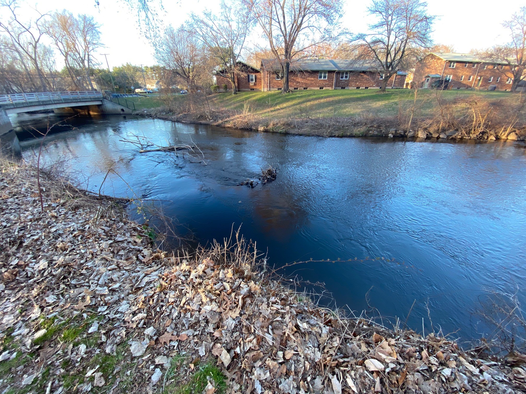 Police investigate suspicious death after body found in river in ...