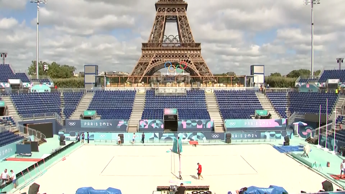 The most iconic Olympic stadium ever? Eiffel Tower watches over beach ...