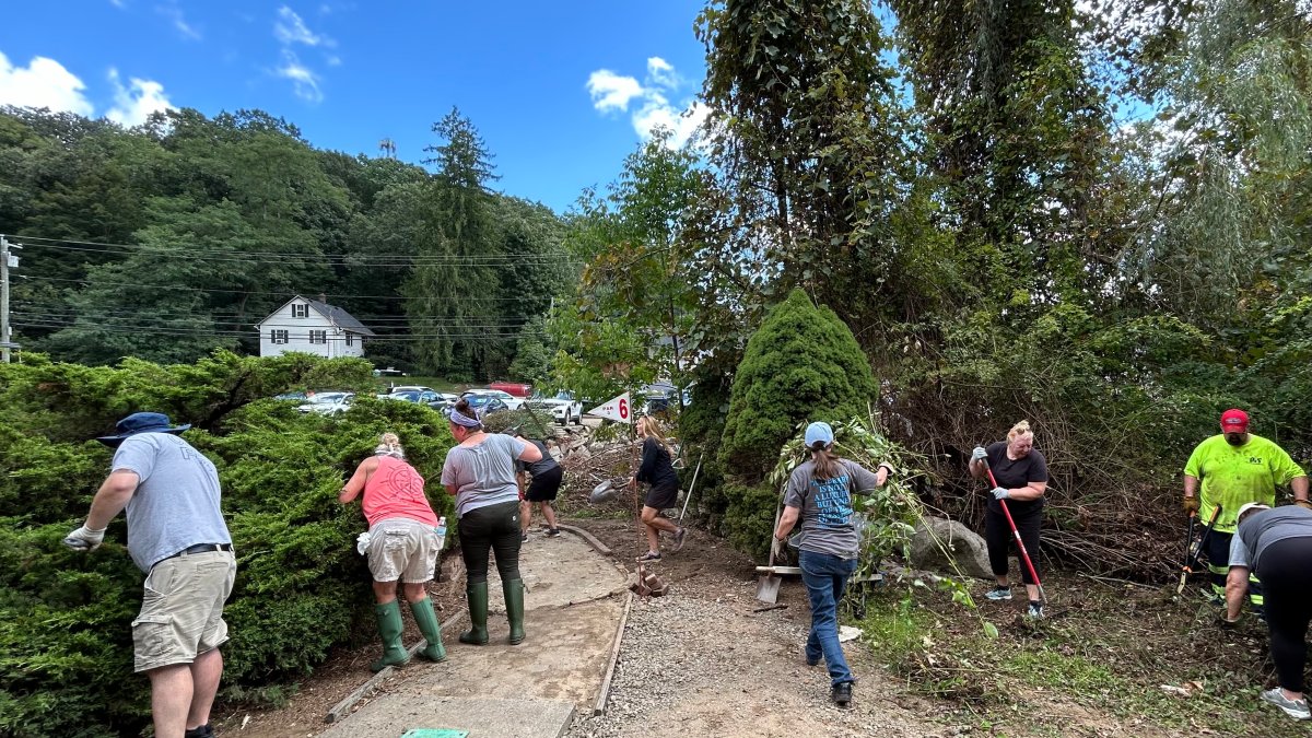 Volunteers spend Labor Day cleaning up in Oxford two weeks after floods ...