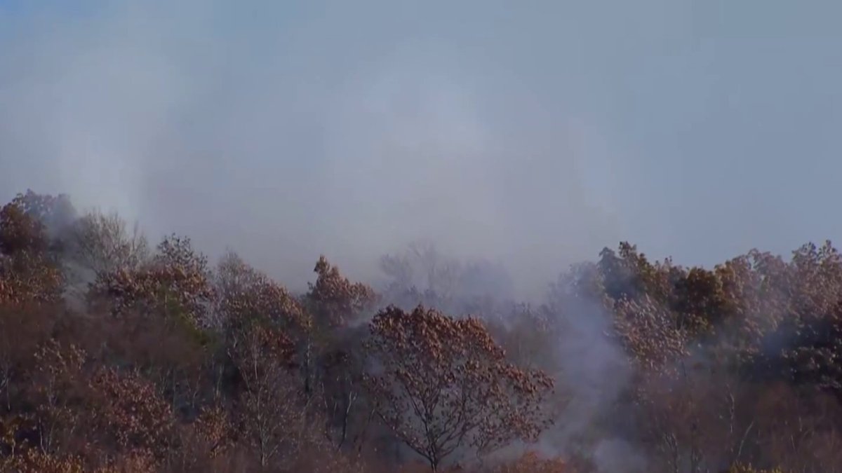 Crews urge people to stay off Lamentation Mountain as they battle ...