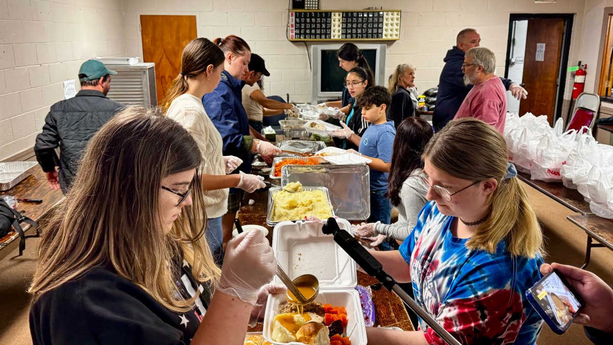 Torrington students serve hot meals to-go for those in need on ...
