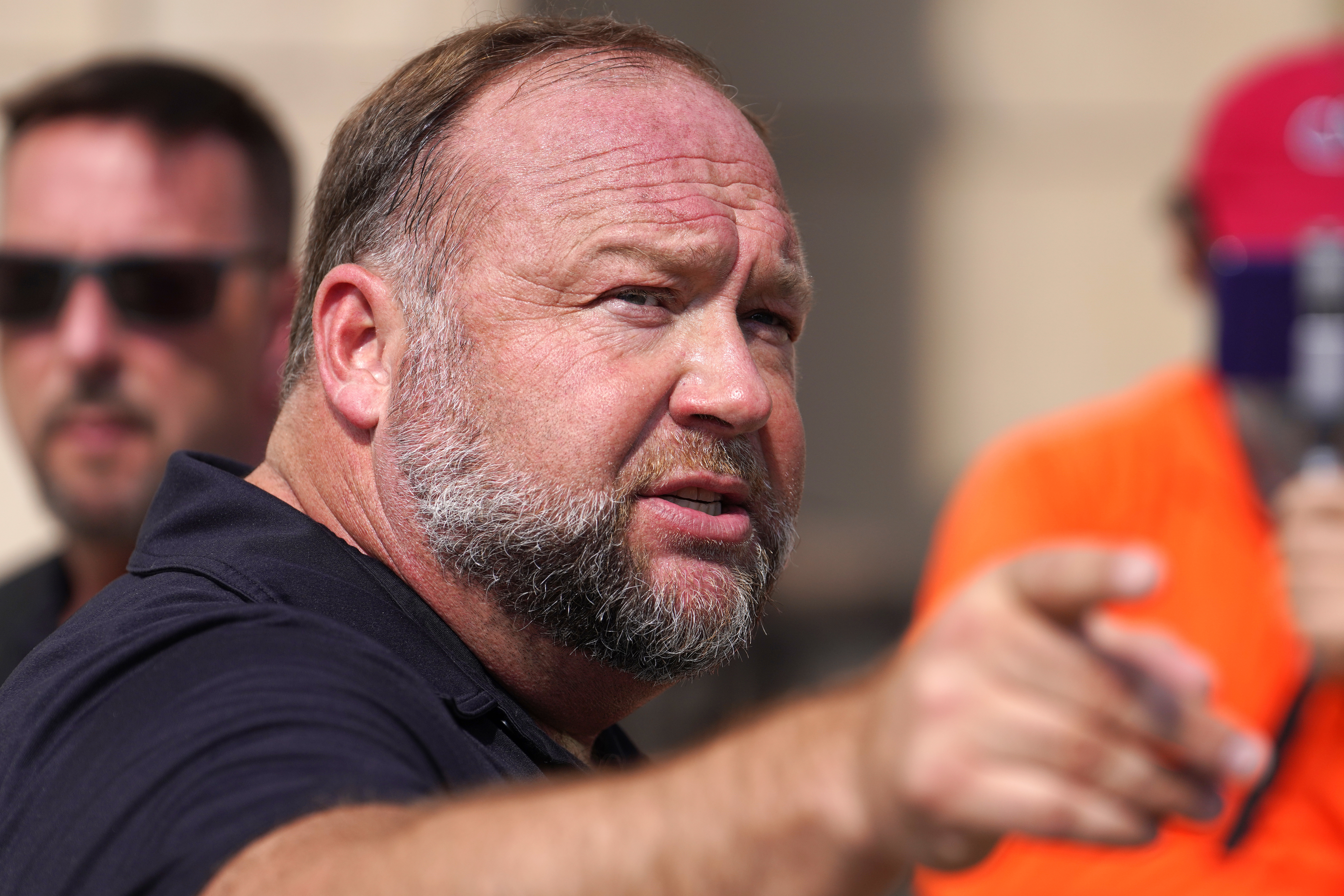 Alex Jones keeps Infowars for now after judge rejects The Onion’s ...