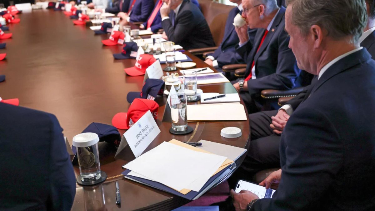 Photo appears to show Mike Waltz using Signal-like app that can archive ...