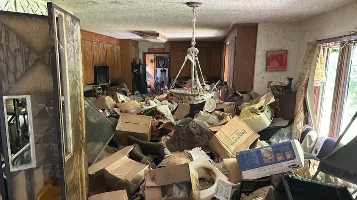 Police video looks inside home of retired detective found dead in ...