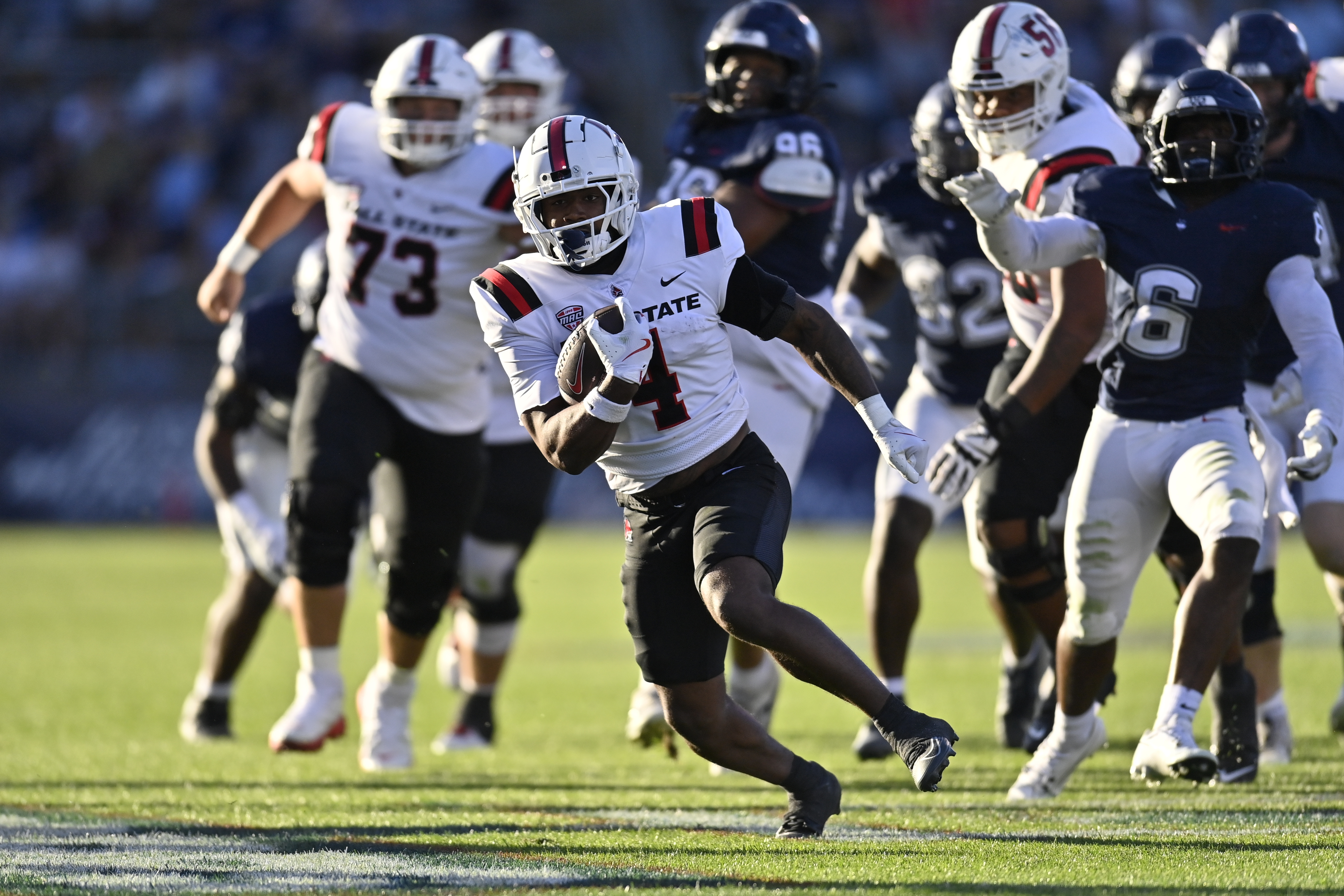 Bell, Edwards each rack up over 100 yards, UConn gets by Ball State 31 ...